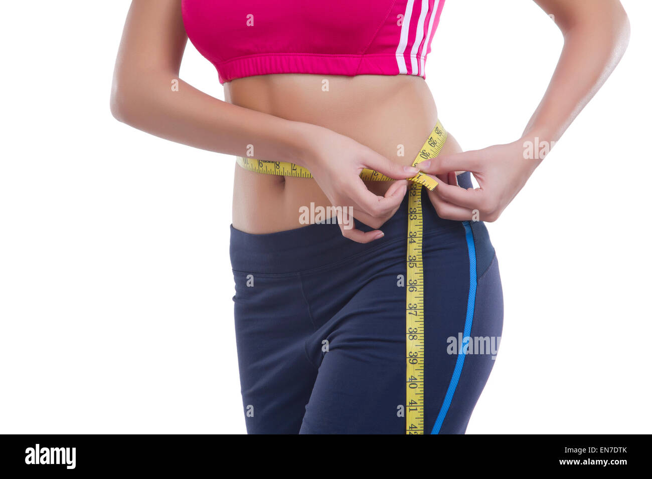 Woman measuring her waist Stock Photo - Alamy Woman measuring her waist Stock Photo - Alamy