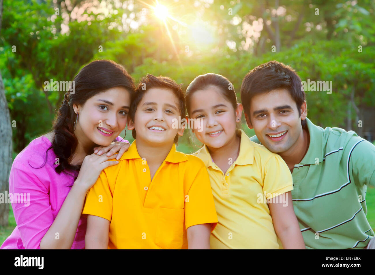 Portrait of family smiling Stock Photo - Alamy