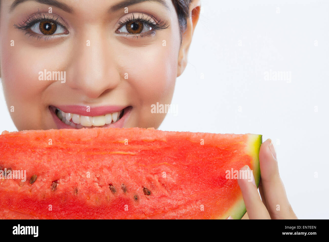 Portrait of a woman with a watermelon Stock Photo - Alamy