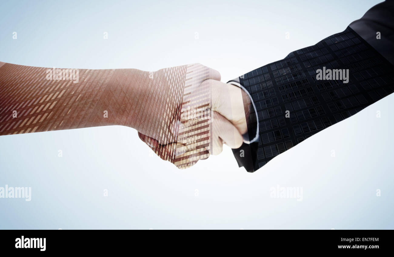 Composite image of close up of a handshake Stock Photo - Alamy