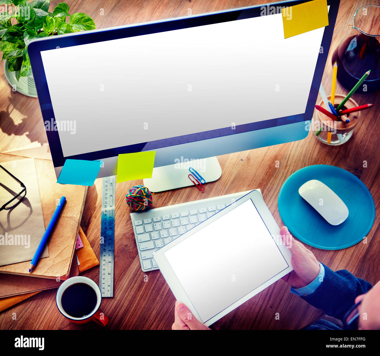 Man Using Digital Devices in the Office Stock Photo - Alamy