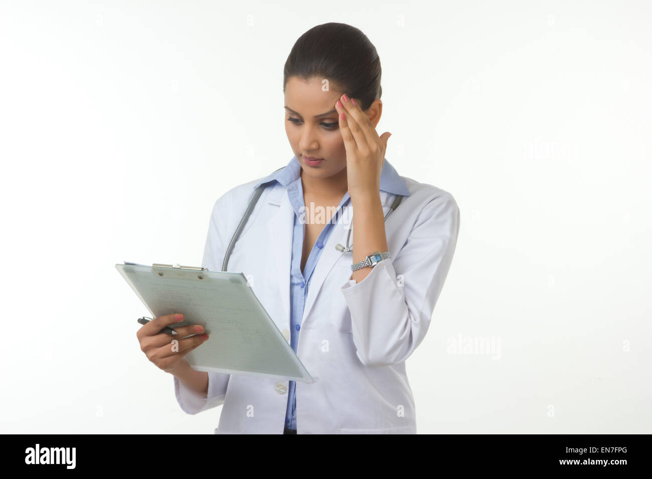 Female doctor thinking Stock Photo - Alamy
