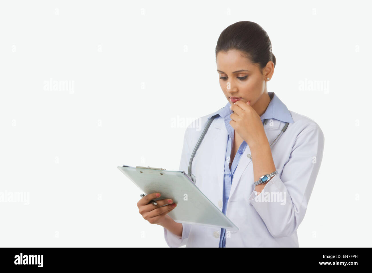 Female doctor thinking Stock Photo - Alamy