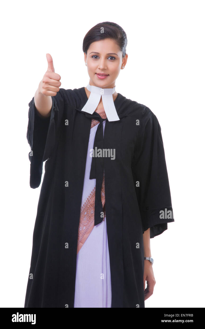 Portrait of female lawyer giving thumbs up Stock Photo - Alamy