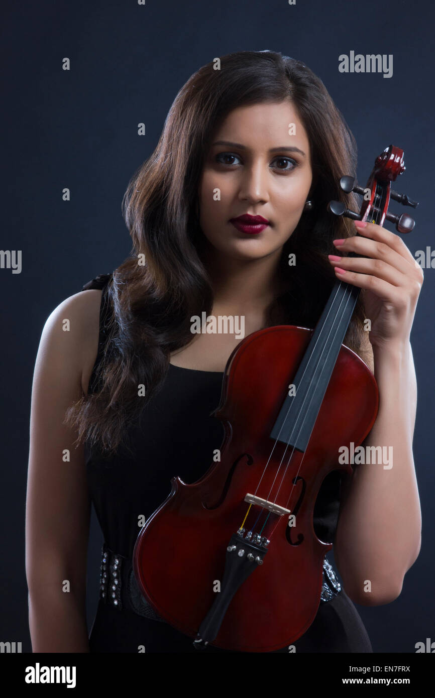 Portrait of woman with violin Stock Photo - Alamy