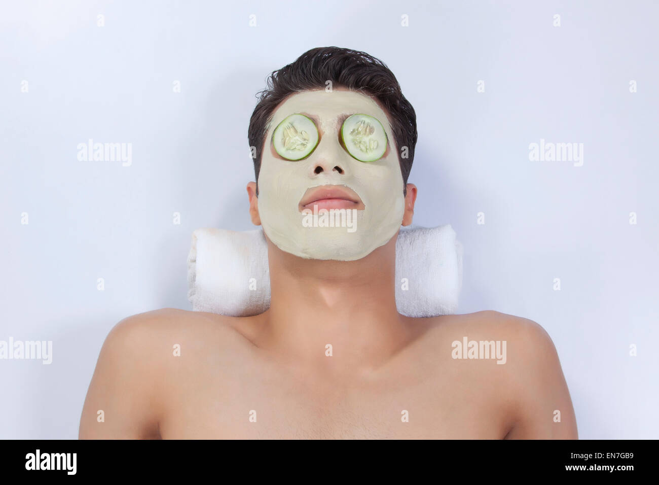 Young man getting a facial Stock Photo - Alamy