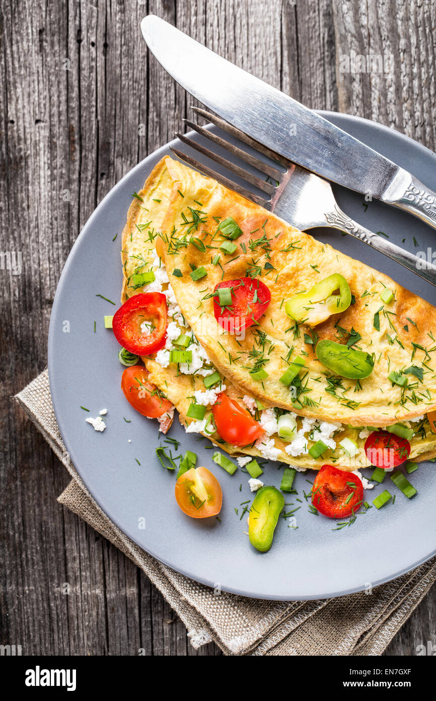 Omelette with vegetables Stock Photo - Alamy