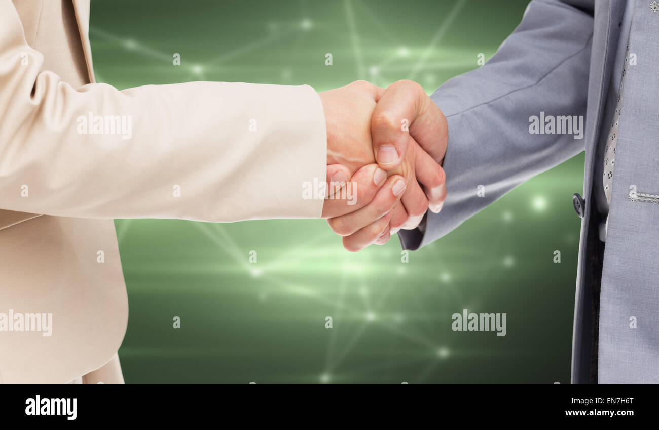 Composite image of close up of people shaking hands Stock Photo - Alamy