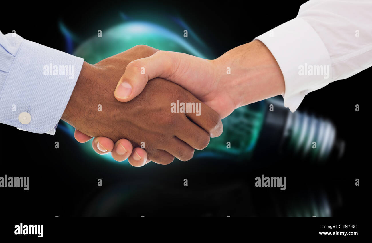 Business partners handshake glowing light hi-res stock photography and images - Alamy
