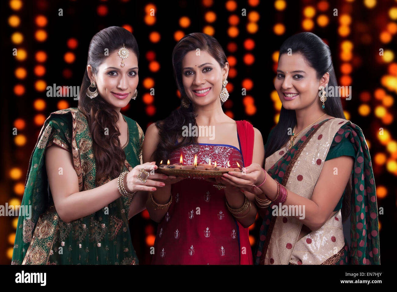 Young women celebrating Diwali Stock Photo - Alamy