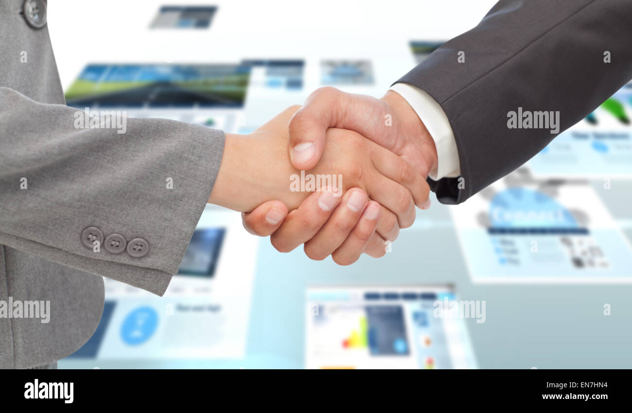 Composite image of handshake between two business people Stock Photo ...
