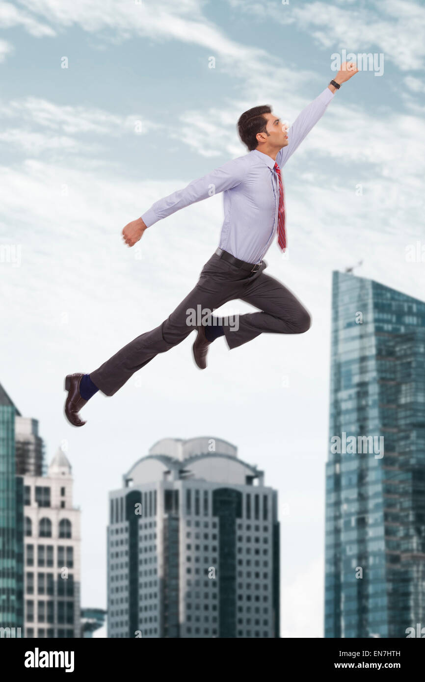 Business executive flying in the sky Stock Photo - Alamy