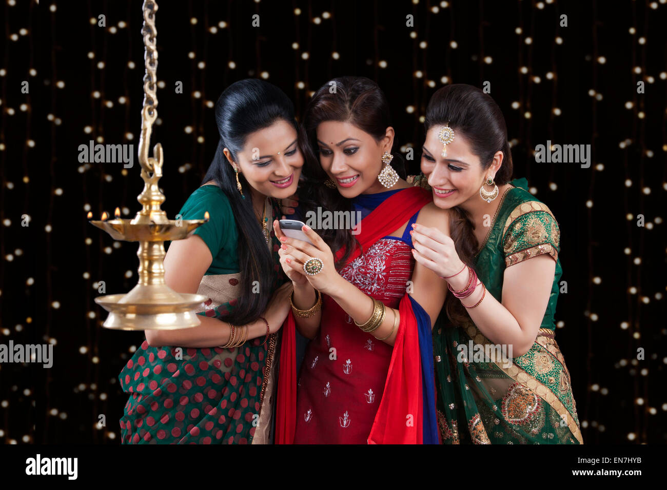 Young women celebrating Diwali Stock Photo - Alamy