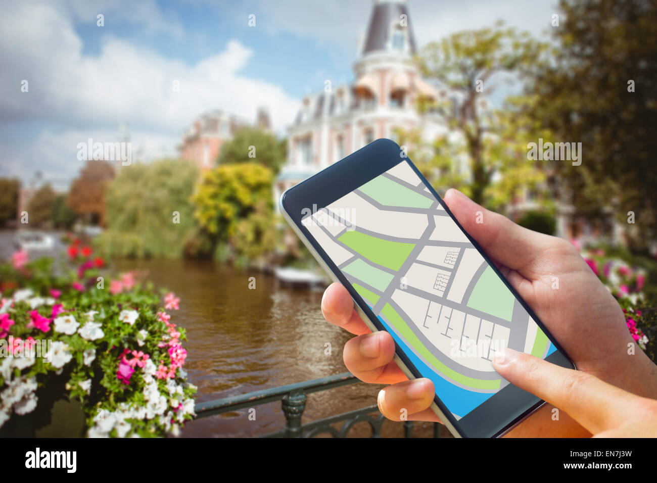 Composite image of man using map app on phone Stock Photo - Alamy