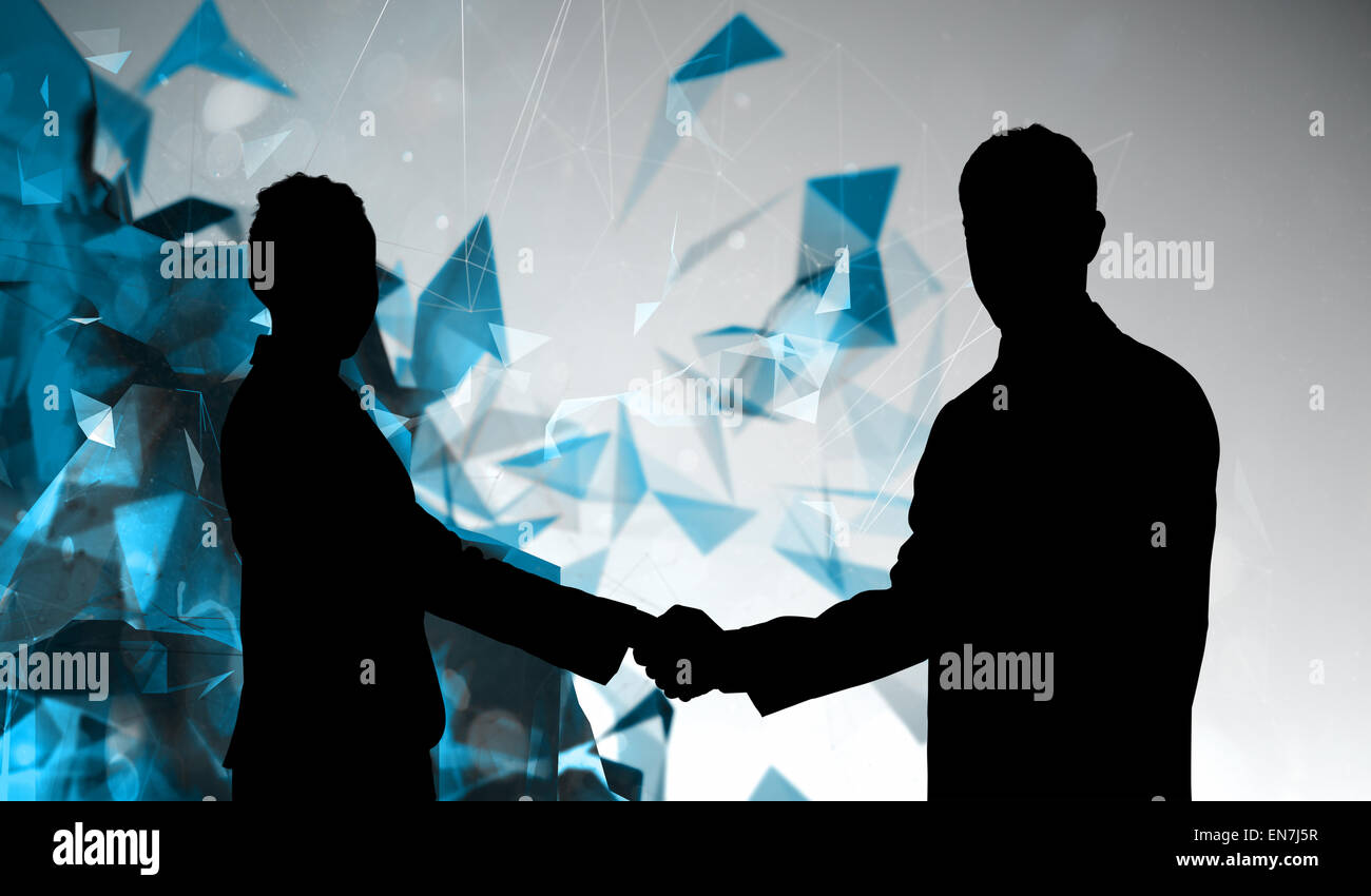 Composite image of smiling business people shaking hands while looking ...