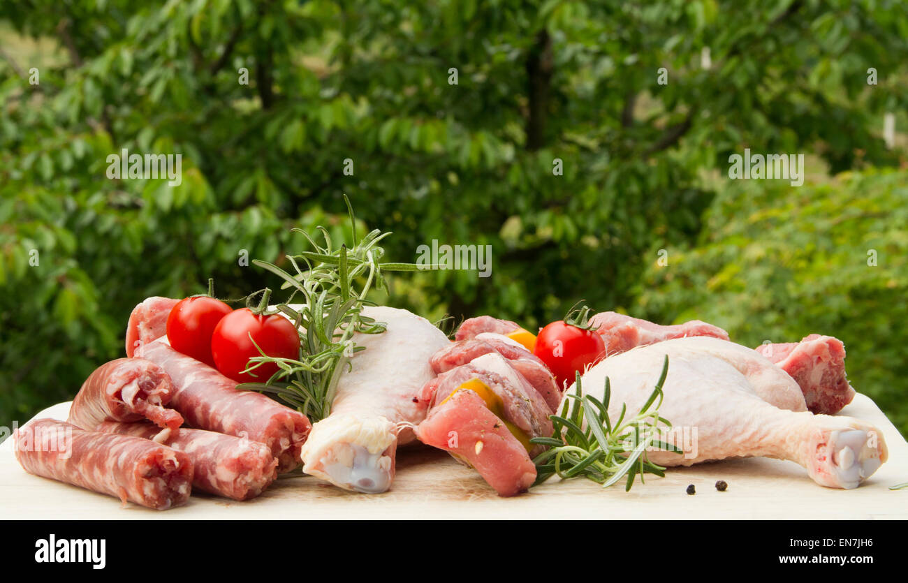 Photo of a different meat with vegetables Stock Photo - Alamy