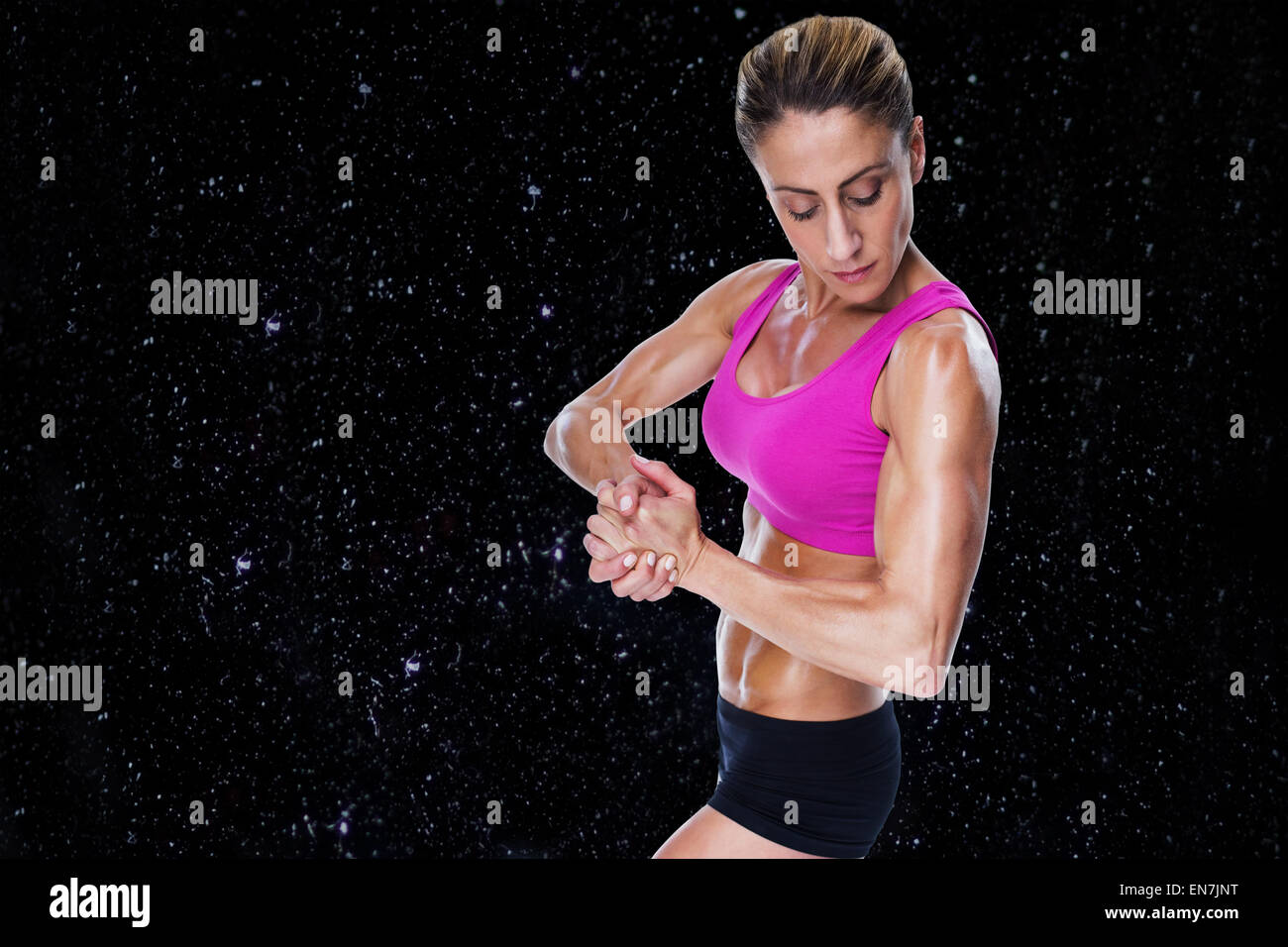 Composite image female bodybuilder flexing hi-res stock photography and ...