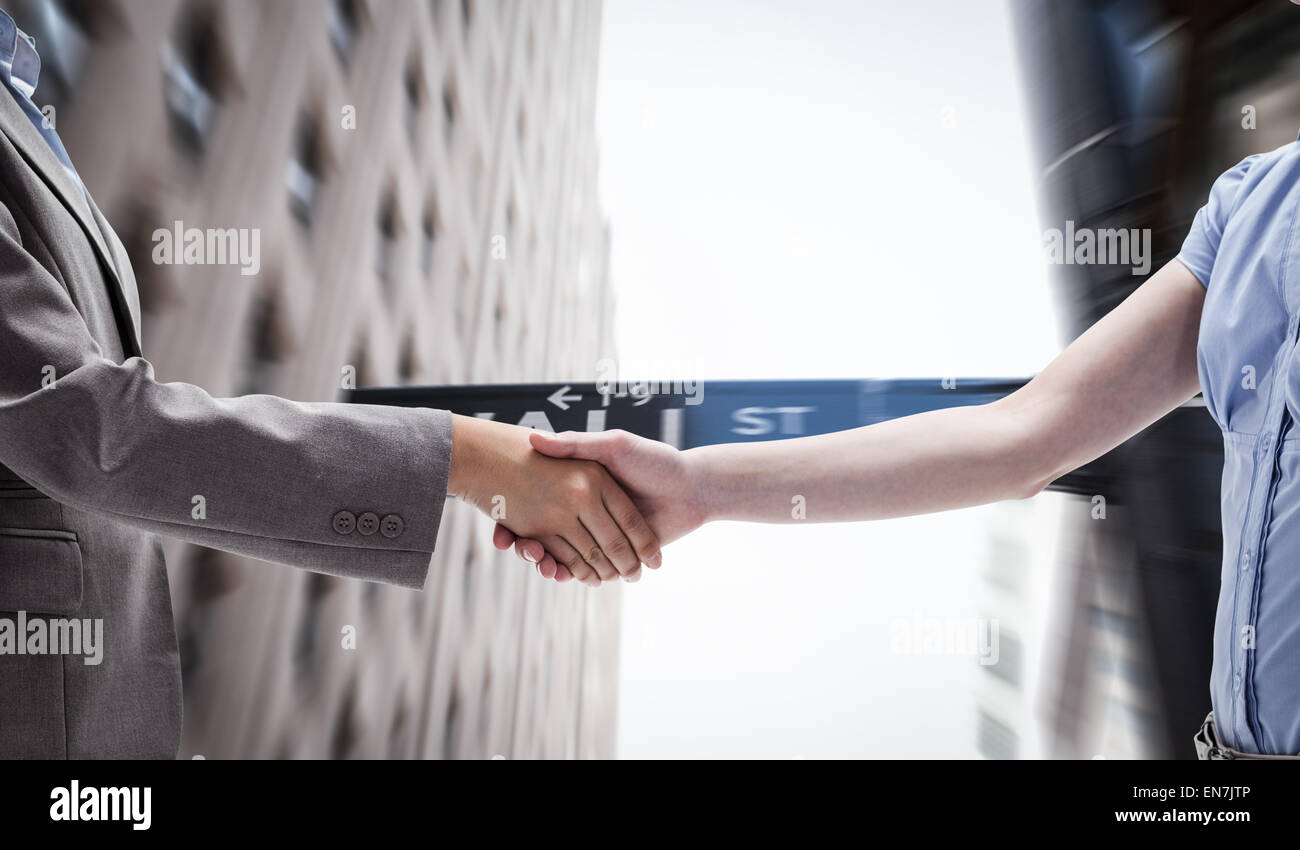 Handshake between women hi-res stock photography and images - Alamy