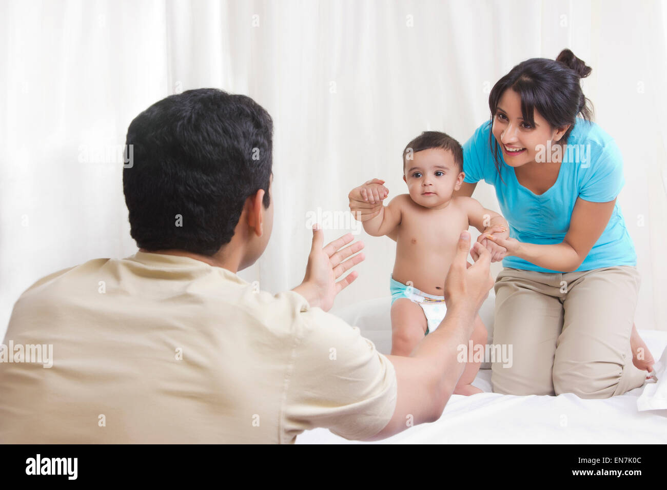 Father calling baby Stock Photo - Alamy