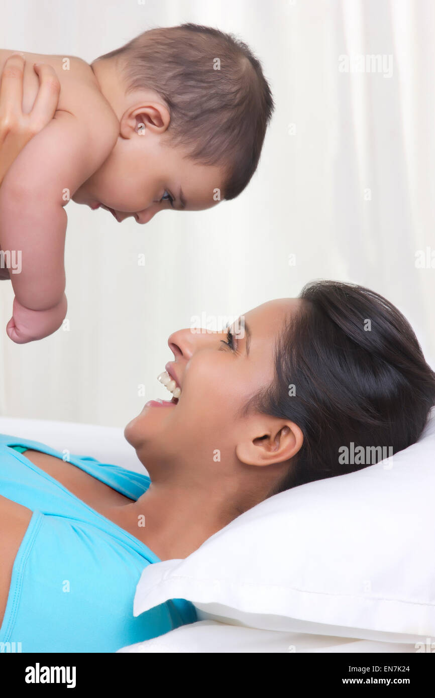 Mother and baby enjoying Stock Photo - Alamy