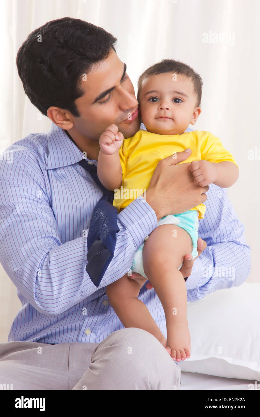 Portrait of baby with father Stock Photo - Alamy