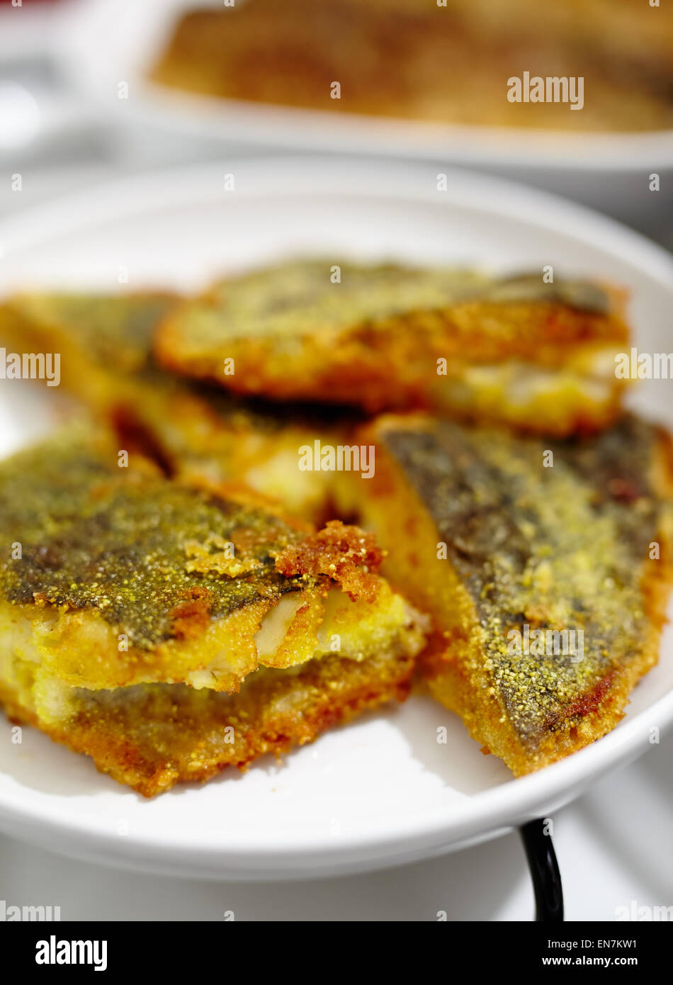 Pan fried sole fish on a plate with selective focus Stock Photo - Alamy