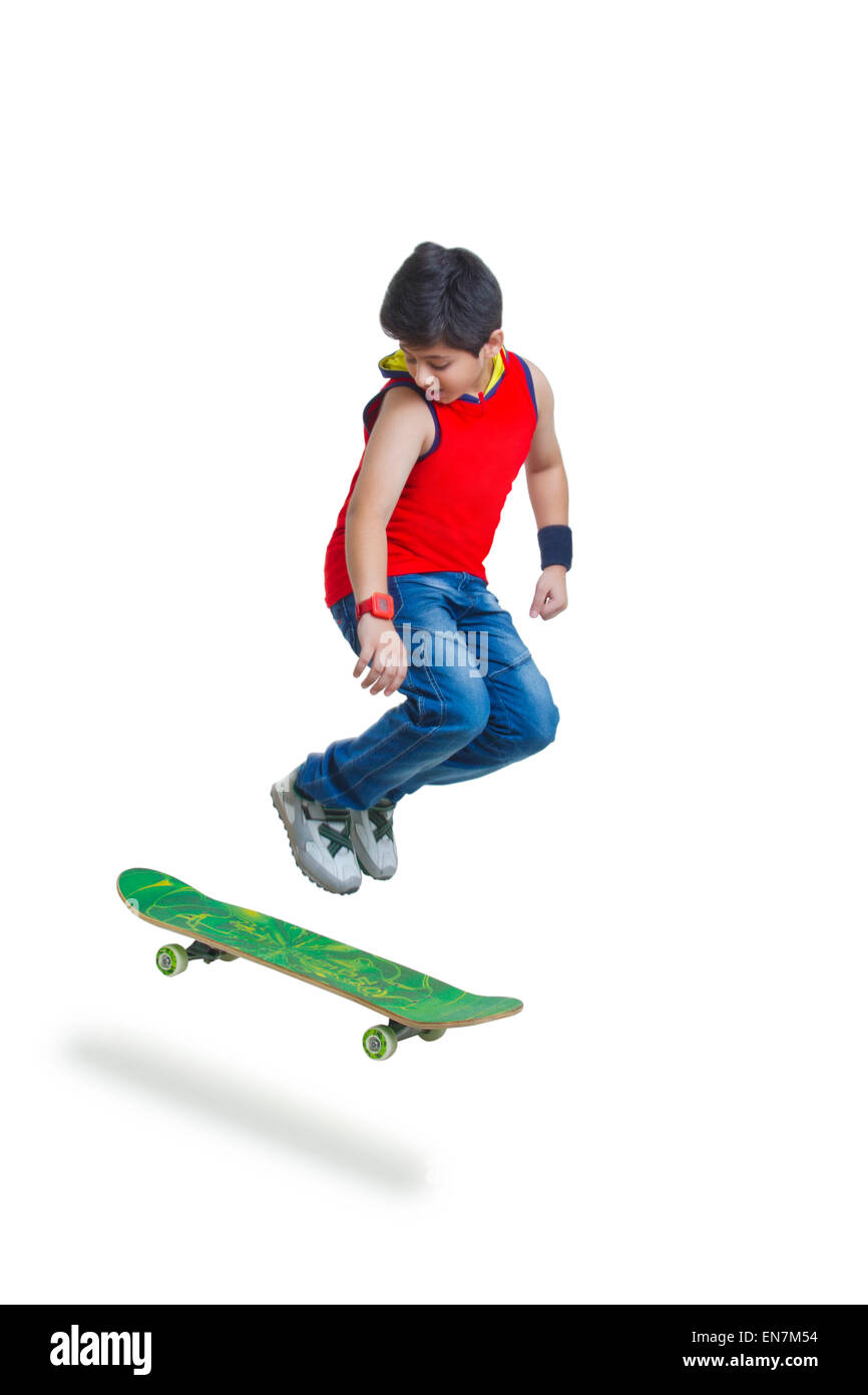 Boy with skateboard jumping Stock Photo - Alamy