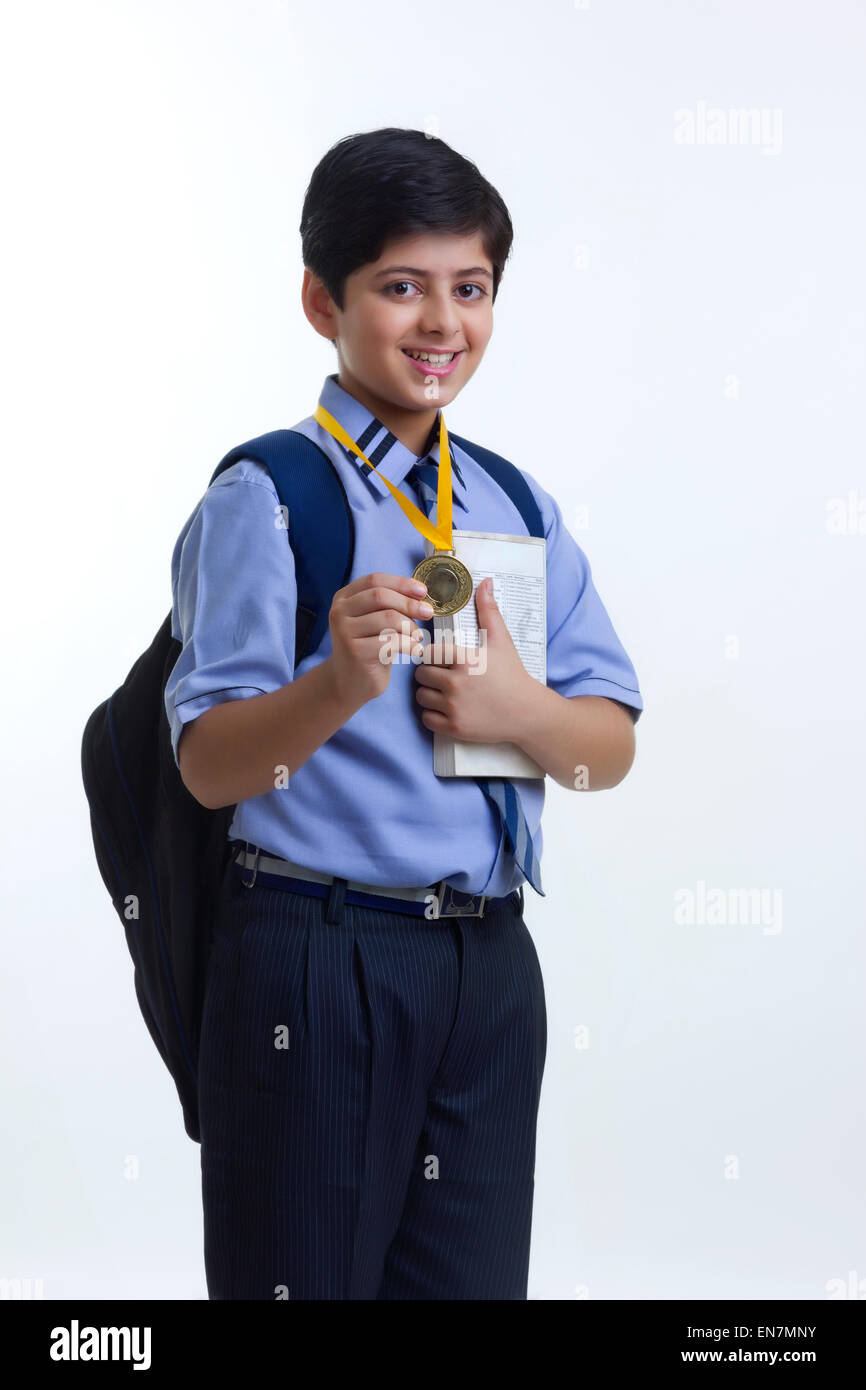 Portrait of school boy with medal Stock Photo - Alamy