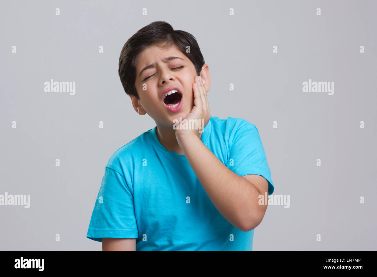 Boy with toothache Stock Photo - Alamy