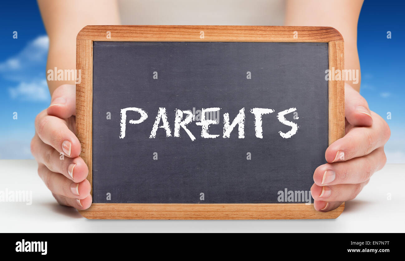 Parents against bright blue sky with clouds Stock Photo - Alamy