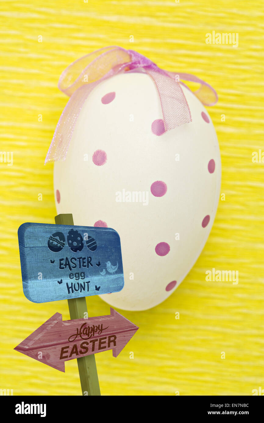 Composite image of easter egg hunt sign Stock Photo - Alamy