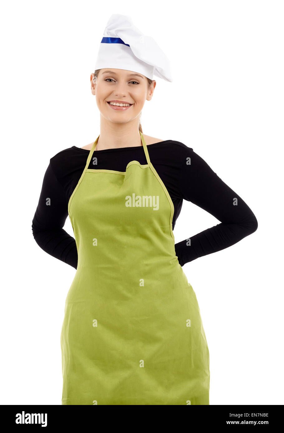 Studio shot of a happy young woman cook isolated on white background ...