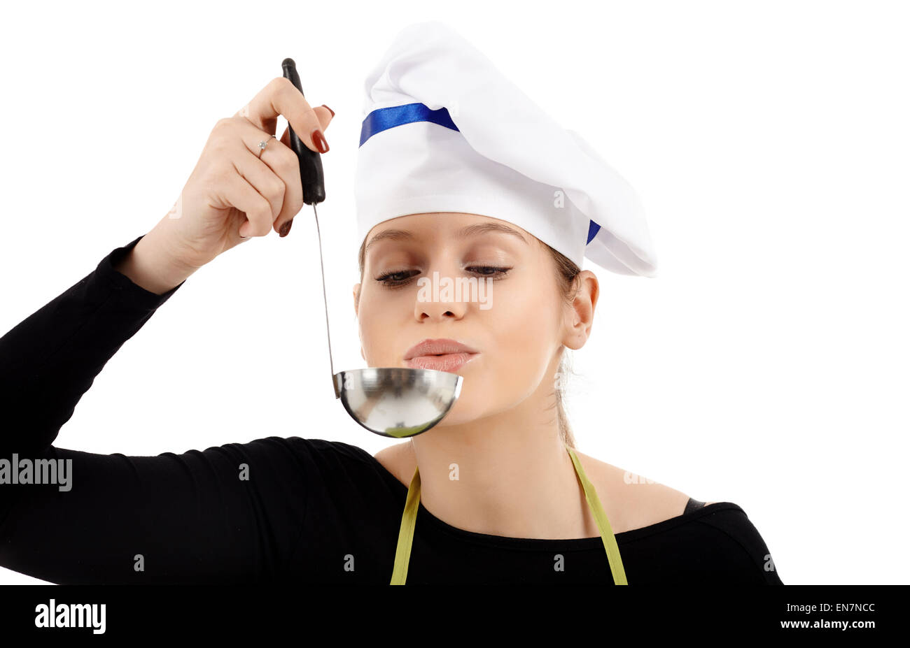 Studio shot of a woman chef tasting the soup isolated on white ...