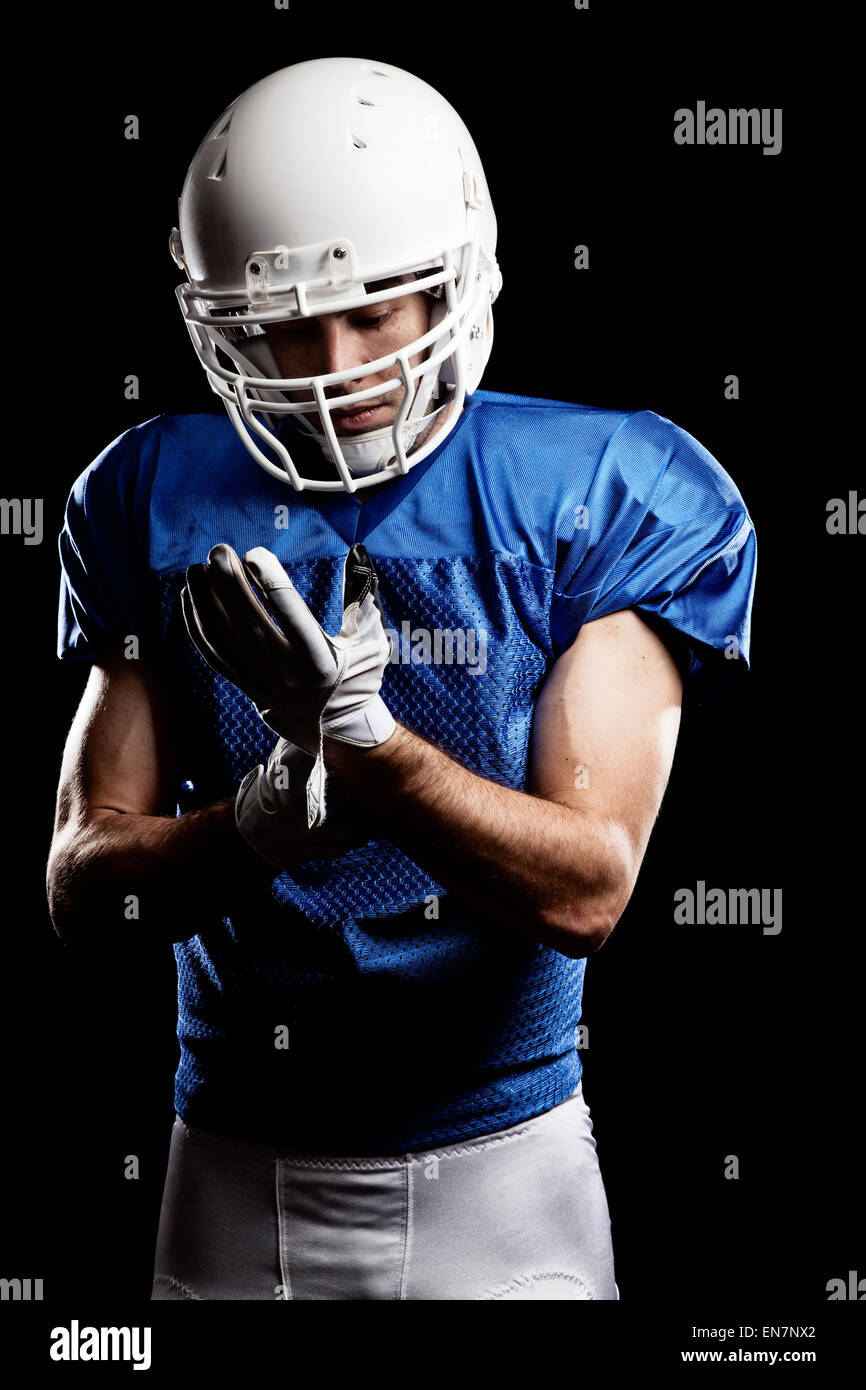 Football player blue uniform hi-res stock photography and images - Alamy