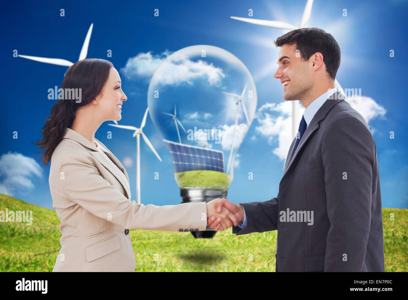 Composite image of future partners shaking hands Stock Photo - Alamy