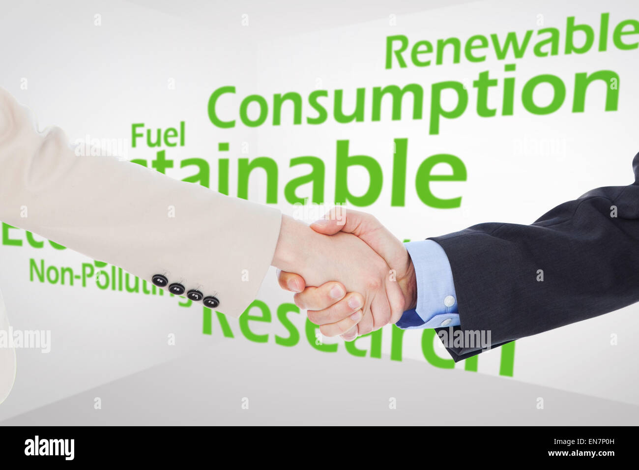 Composite image of smiling business people shaking hands while looking ...