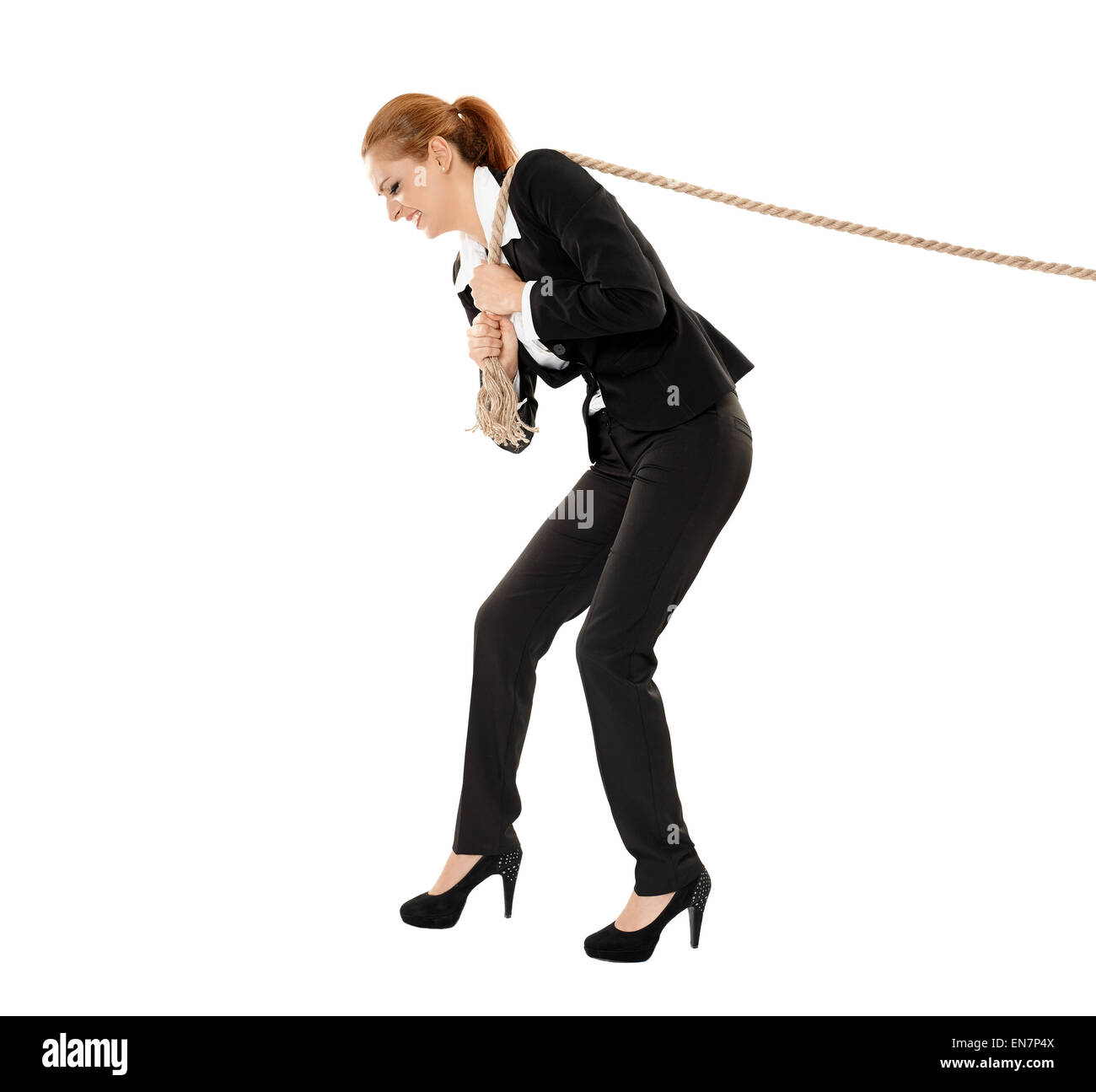 Full length portrait of a businesswoman pulling a rope isolated on ...