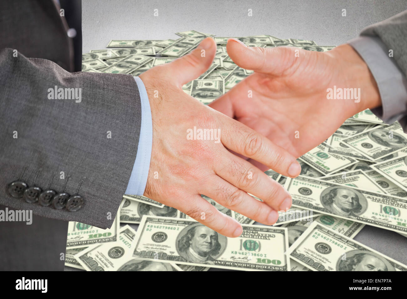 Composite image of two people going to shake their hands Stock Photo ...