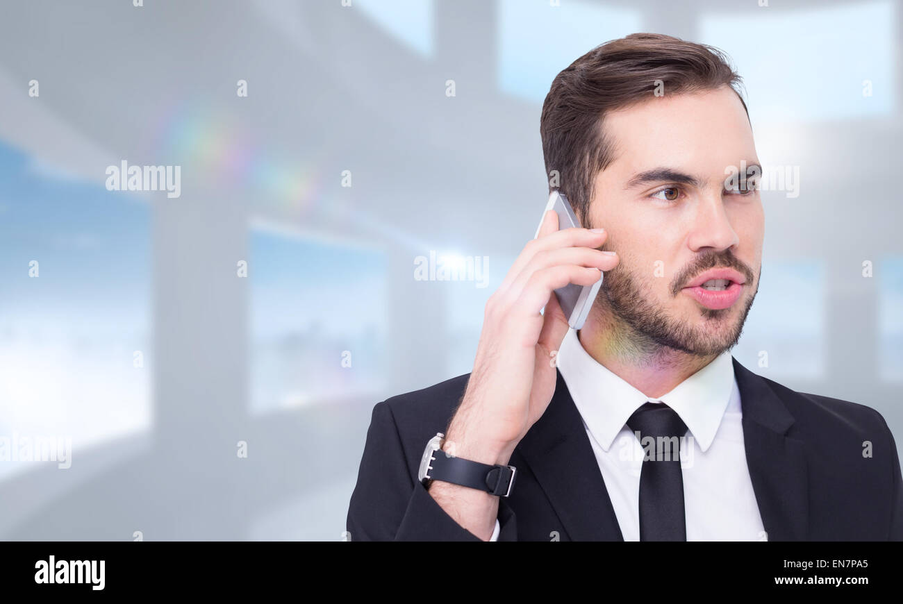 Composite image of smart businessman speaking on the phone Stock Photo ...