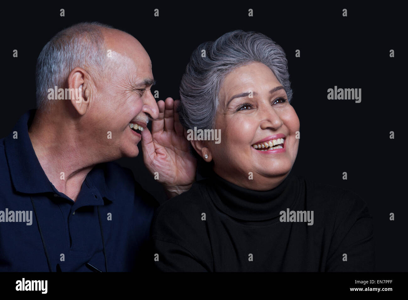 Old man whispering in ear hi-res stock photography and images - Alamy