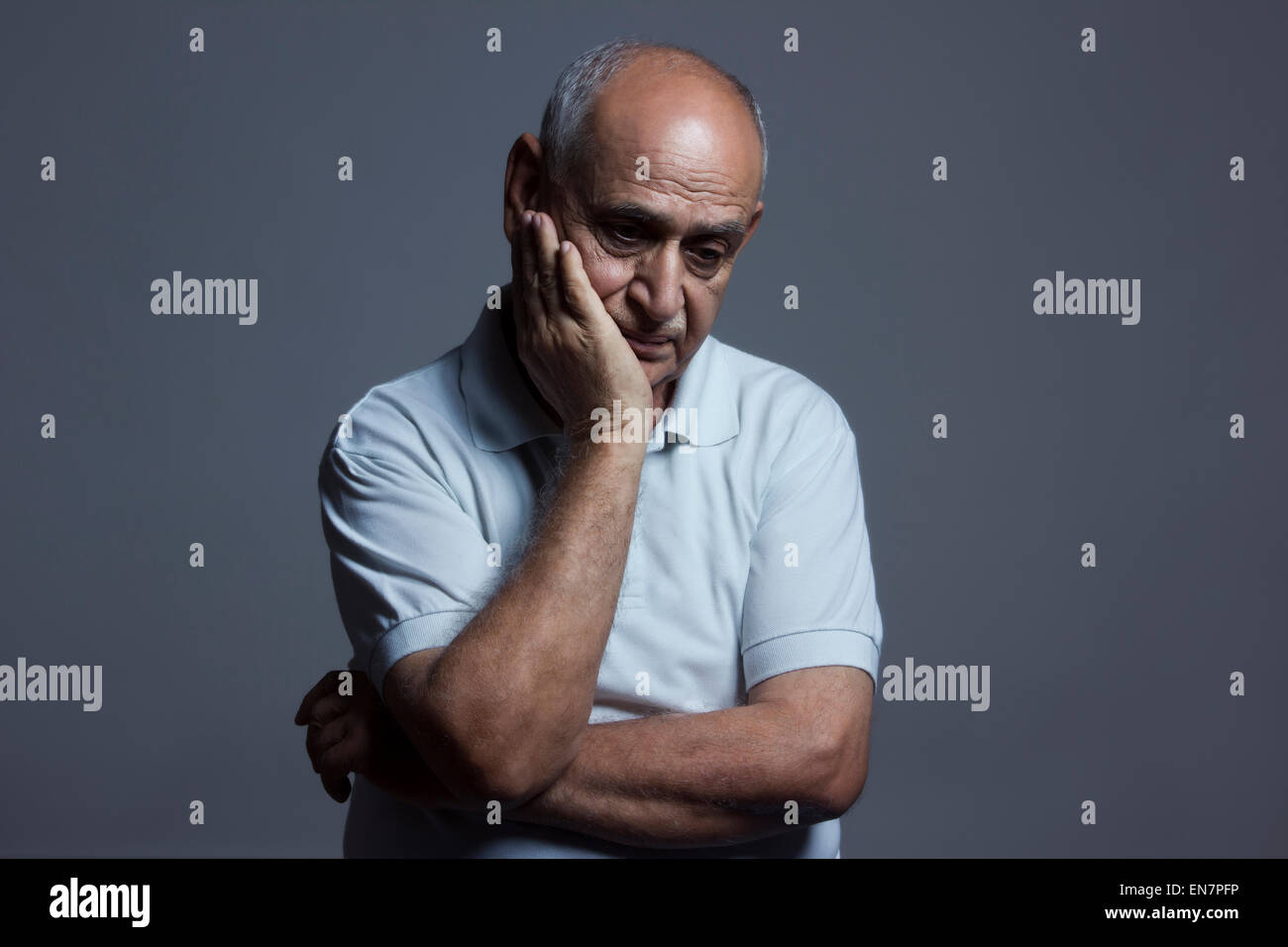 Old man thinking Stock Photo - Alamy