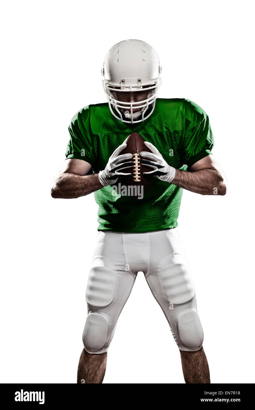 Football Player with a green uniform and a ball in the hand on a white ...