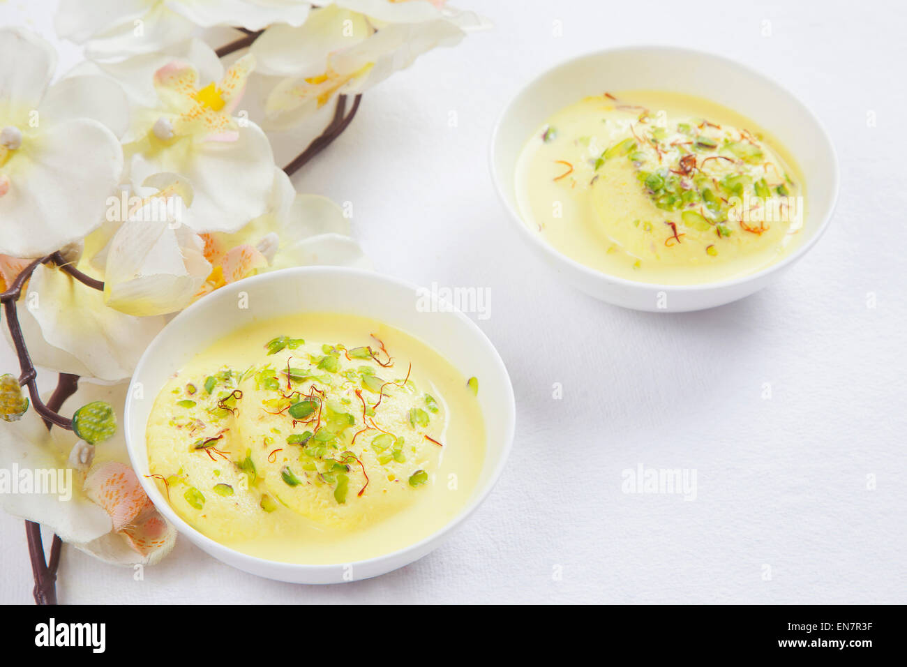 Ras malai in a bowl Stock Photo - Alamy