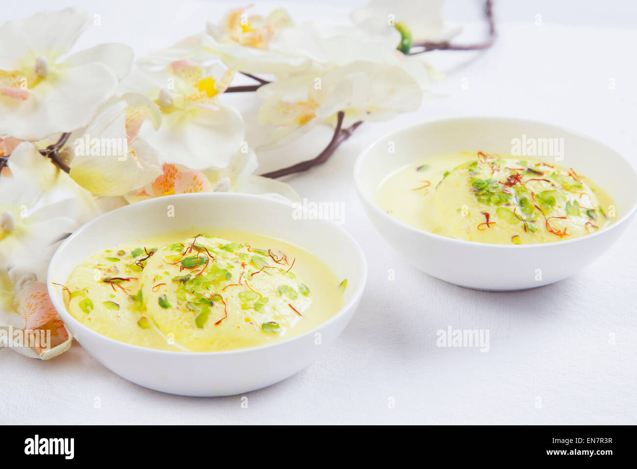 Ras malai in a bowl Stock Photo - Alamy