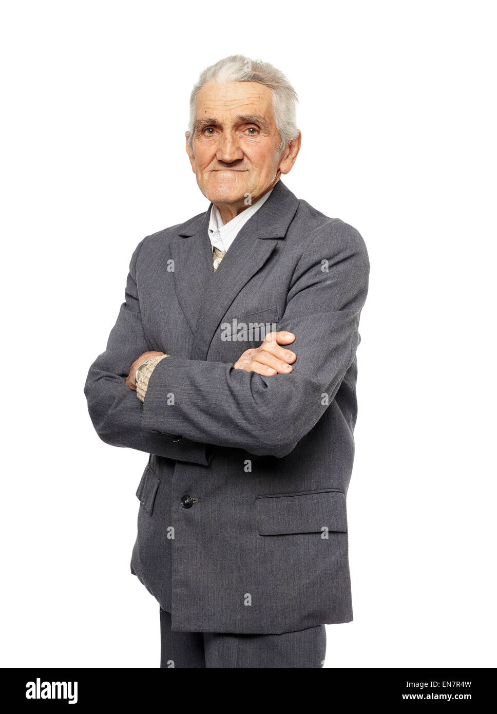 Senior man portrait with crossed arms isolated on white background ...