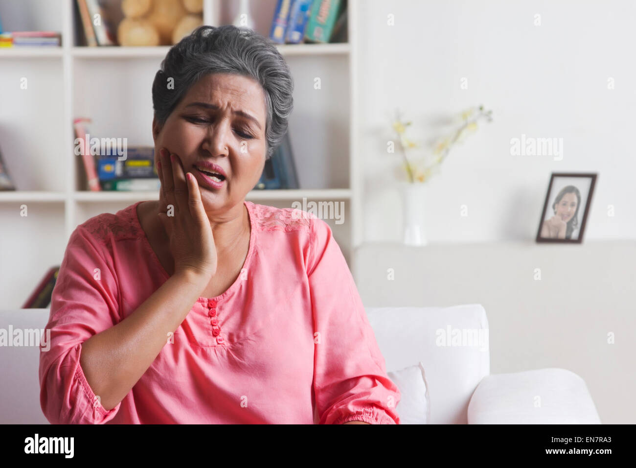 Old woman with toothache Stock Photo - Alamy