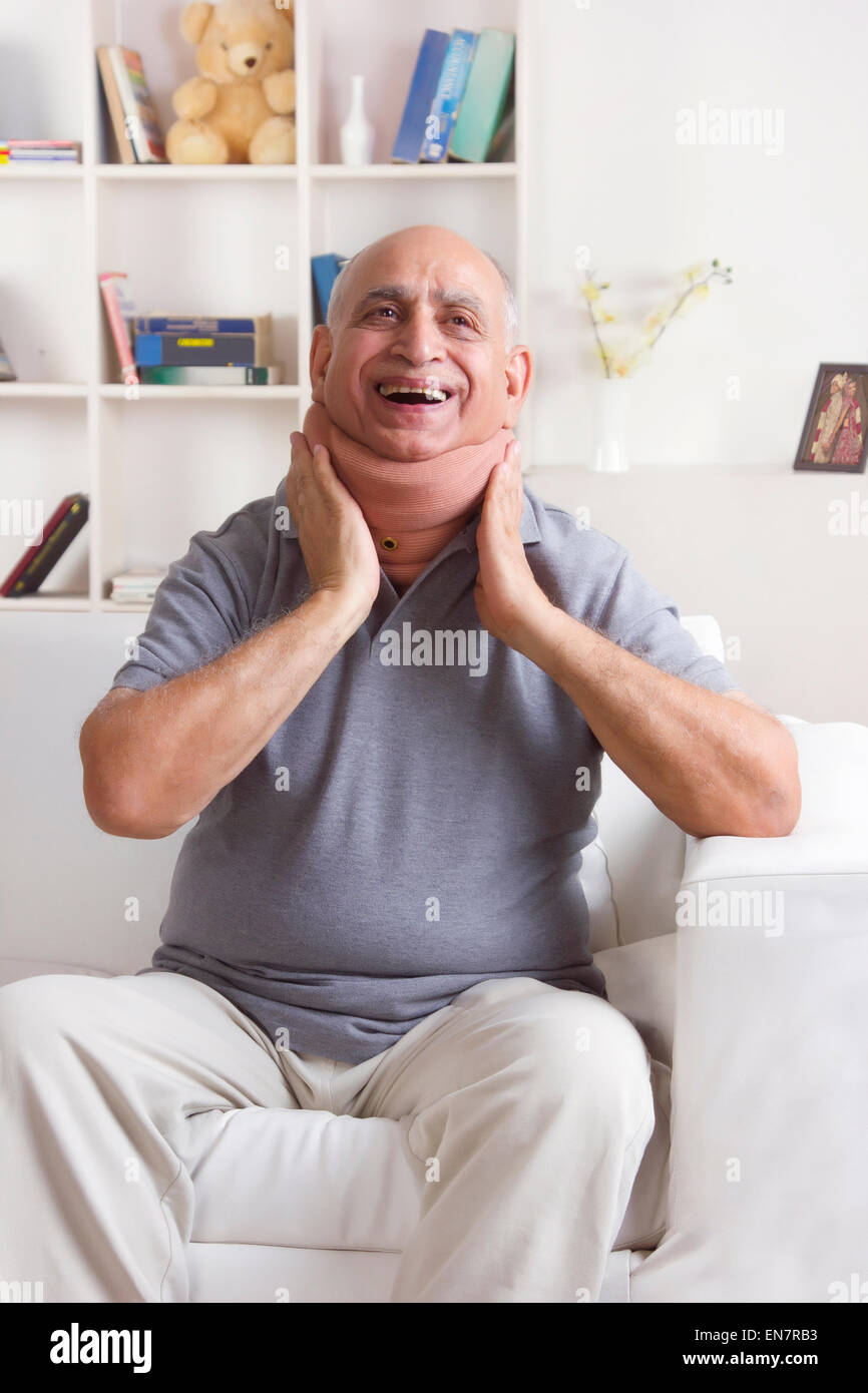 Old man with neck brace Stock Photo - Alamy