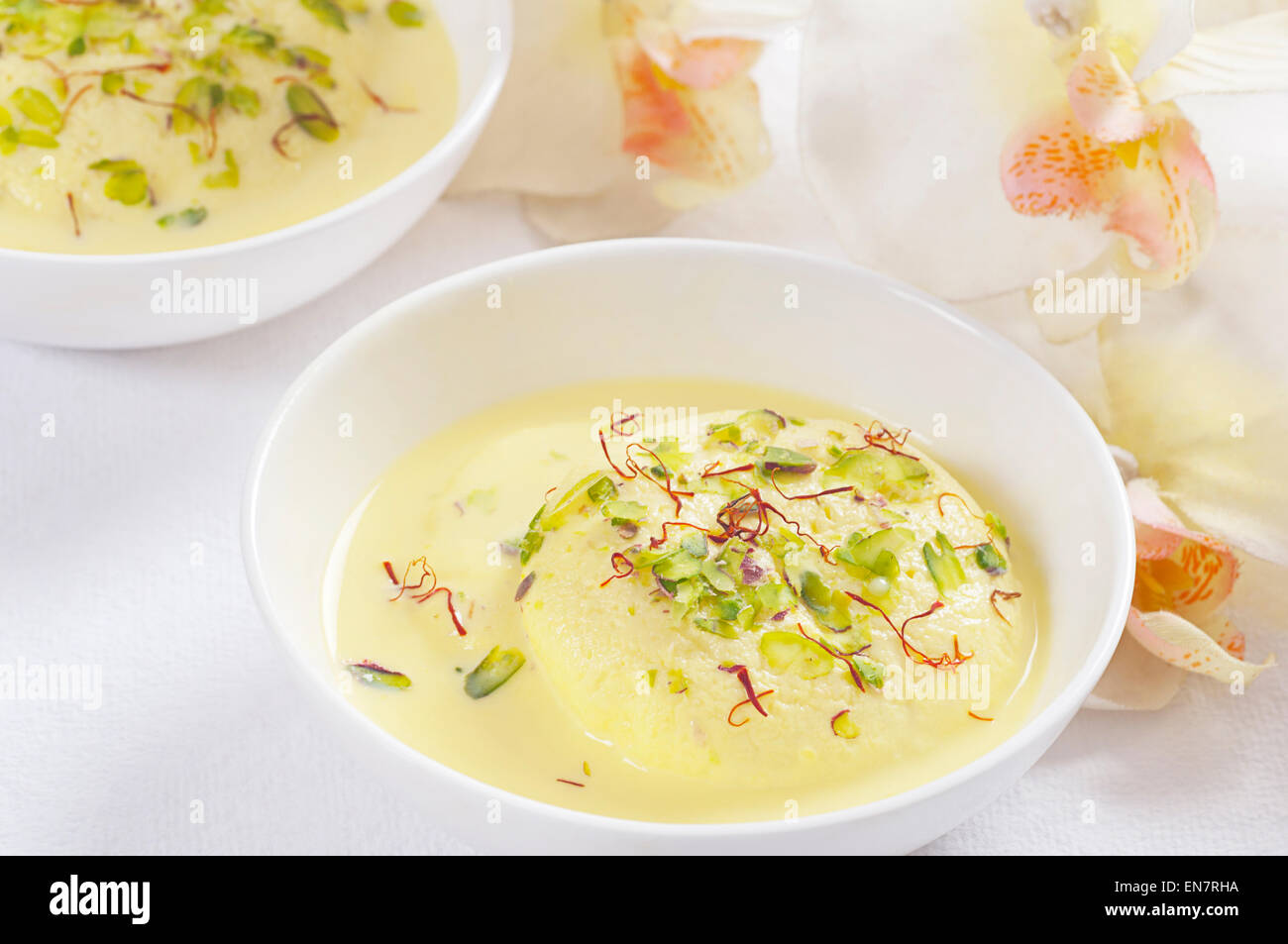 Ras malai in a bowl Stock Photo - Alamy