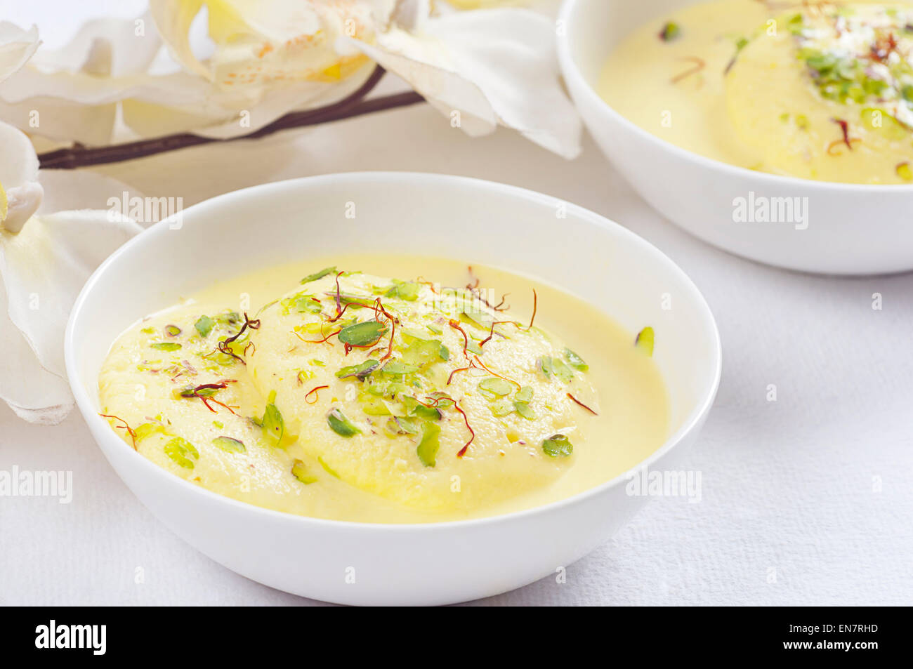 Ras malai in a bowl Stock Photo - Alamy
