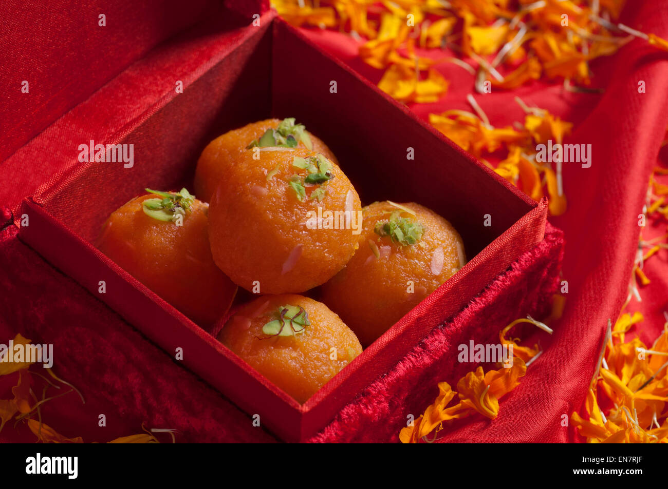 Close-up of laddus in a box Stock Photo - Alamy